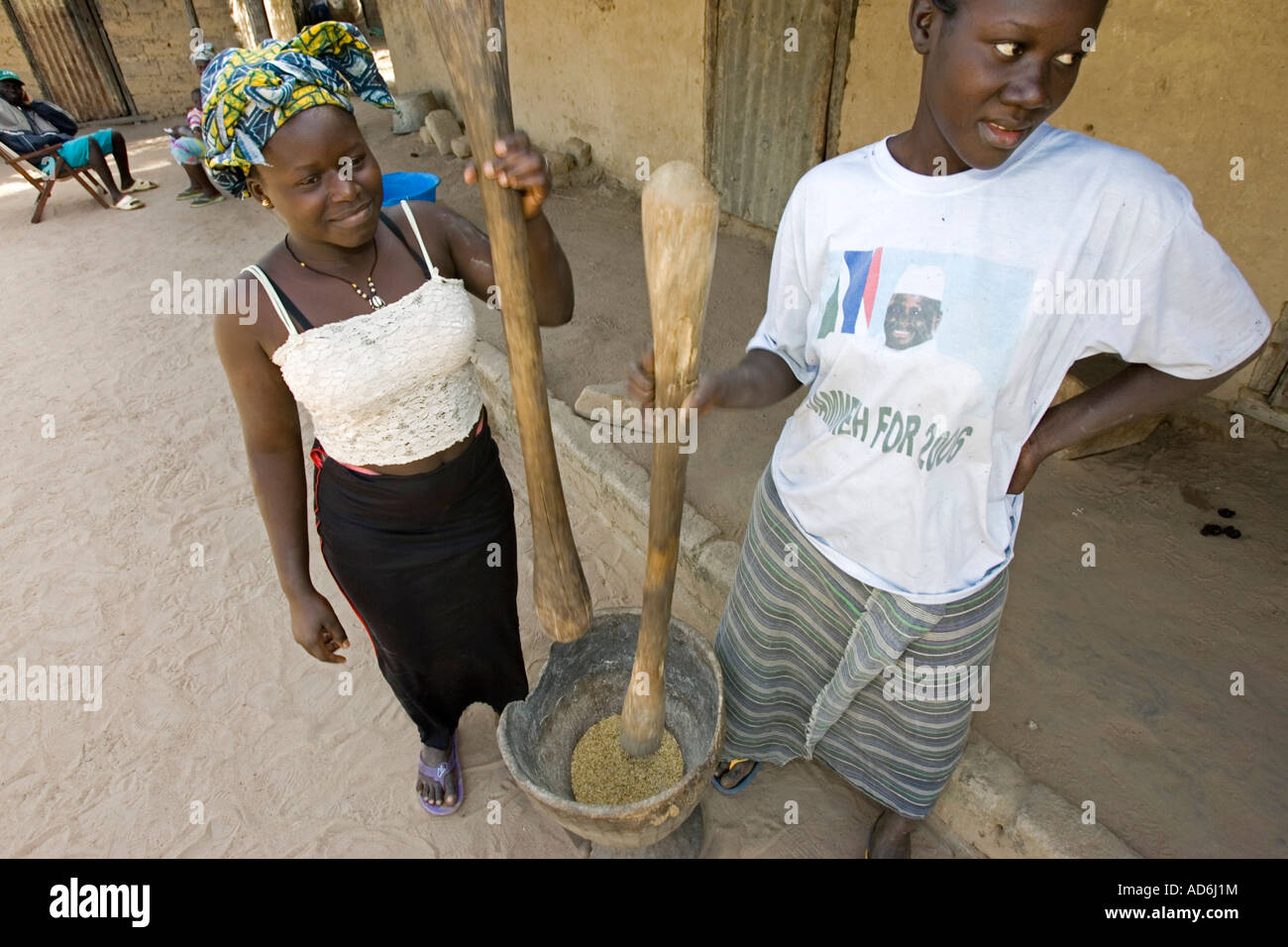 Pestle pounding rice hi-res stock photography and images - Alamy