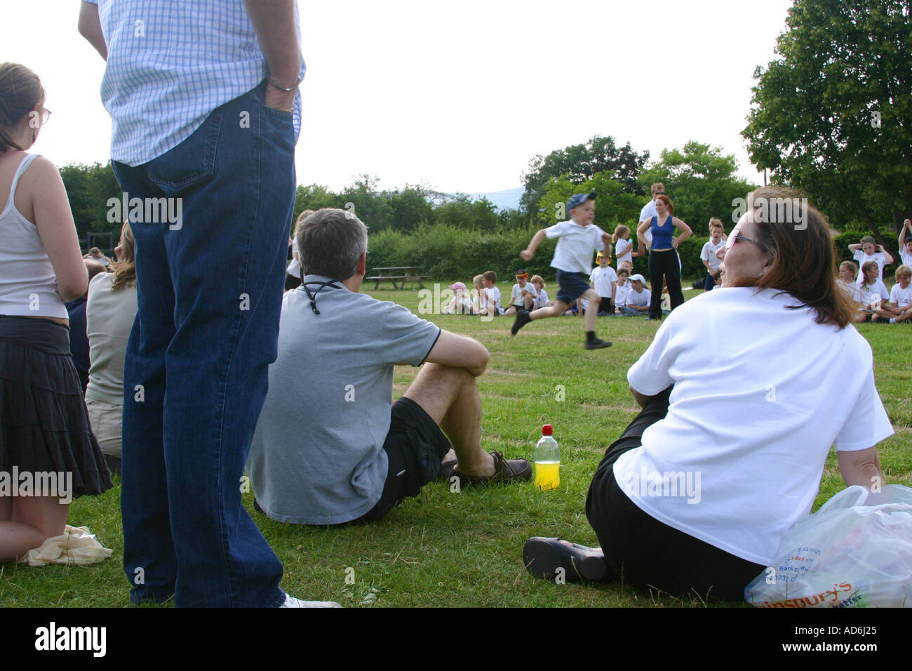 sports day at local school parents watching as child runs by Stock ...