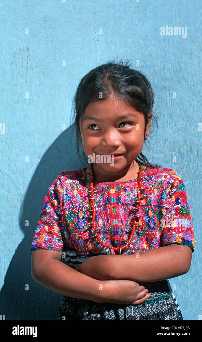 GUATEMALA Portrait of a young Maya girl in traditional stlye costume of ...