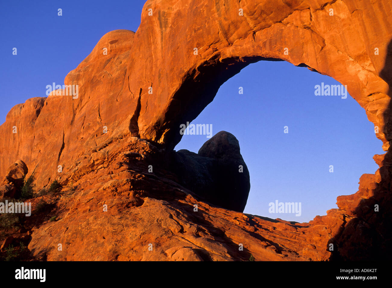 Sunrise light on North Window Windows Section Arches National Park UTAH ...