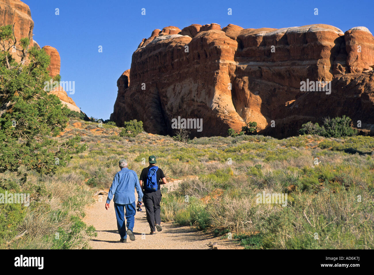 Hikers on the Devils Garden Trail Arches National Park UTAH Stock Photo ...