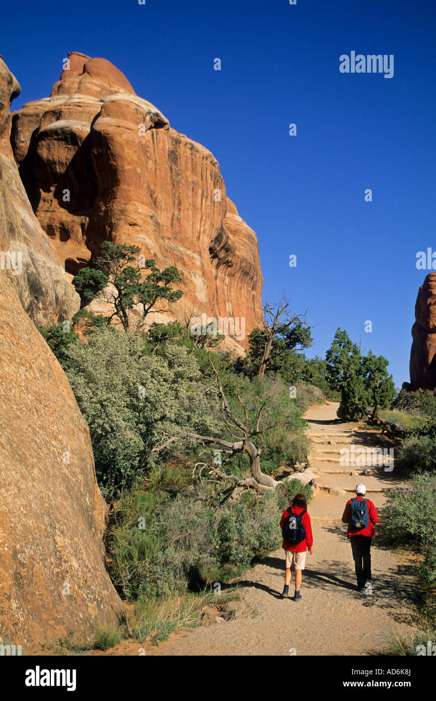 Hikers on the Devils Garden Trail Arches National Park UTAH Stock Photo ...