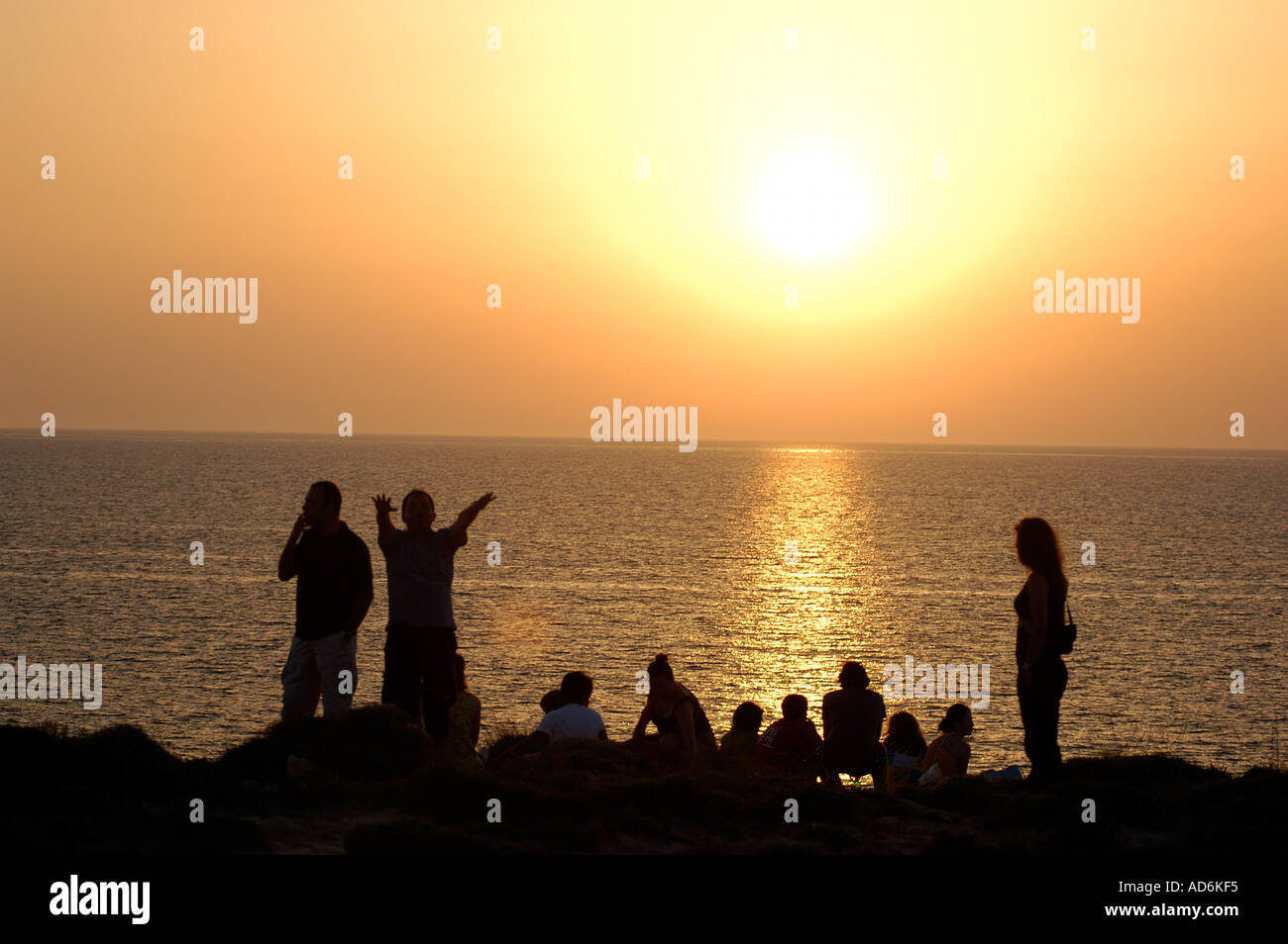 people on sunset Stock Photo - Alamy