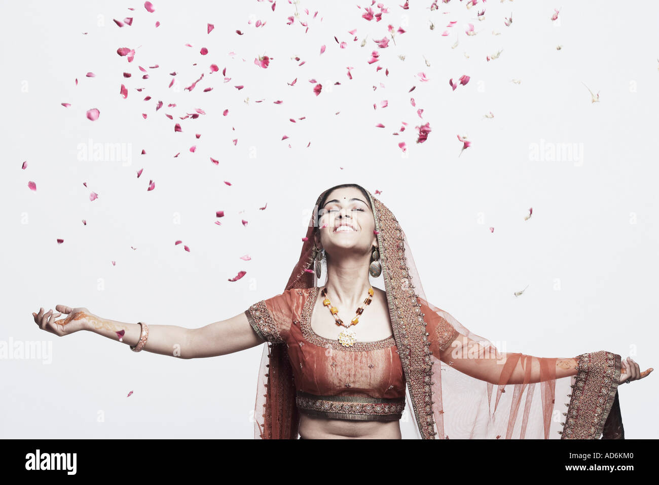 Rose petals falling on woman hi-res stock photography and images - Alamy
