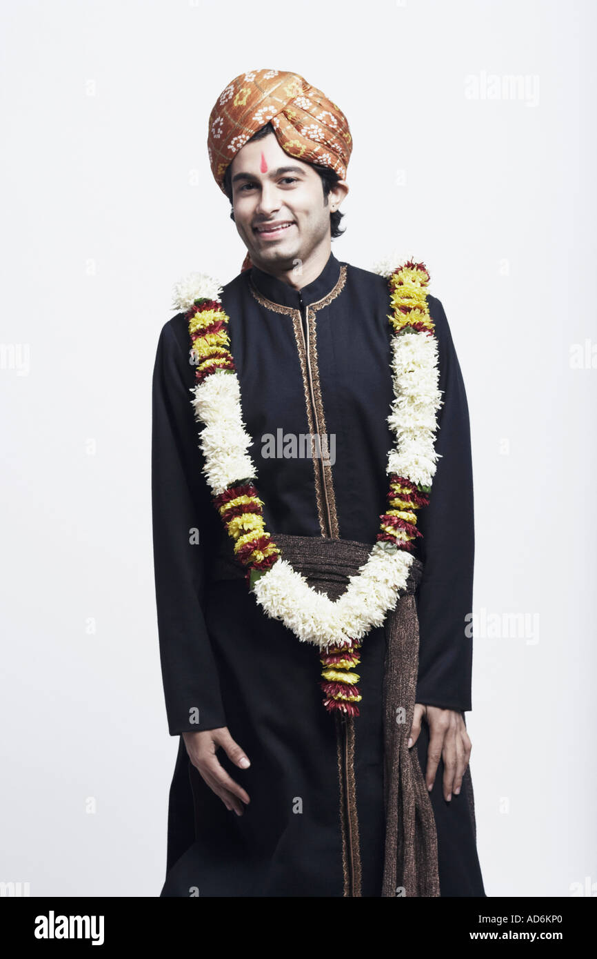 Portrait young man wearing garland hi-res stock photography and images ...