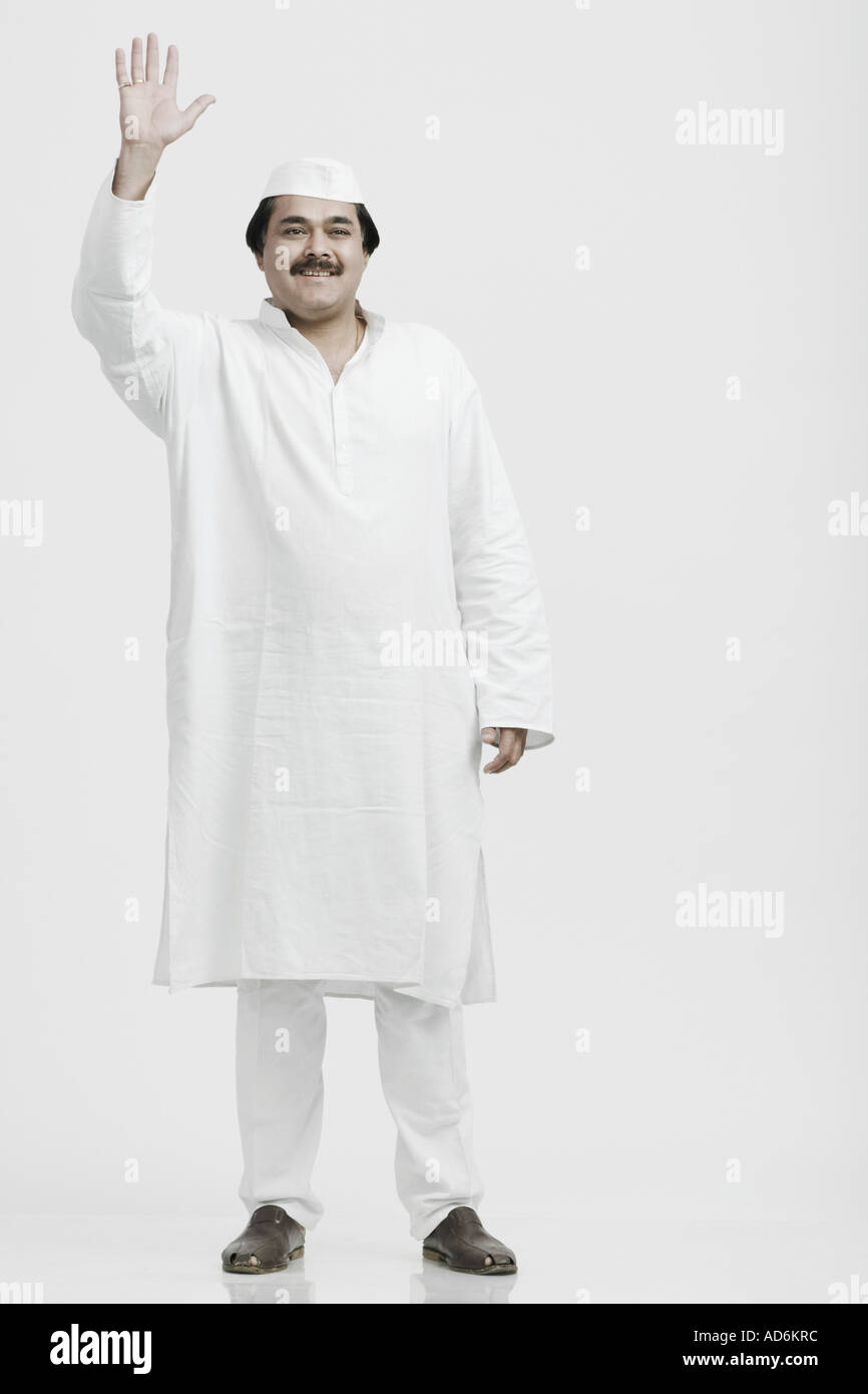 Mature man waving his hand Stock Photo - Alamy