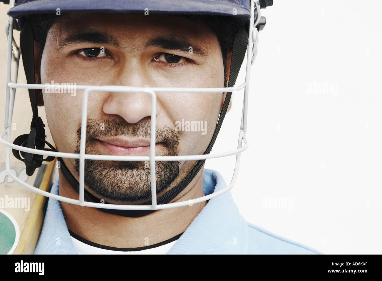 Portrait of a young man wearing a sports helmet Stock Photo - Alamy