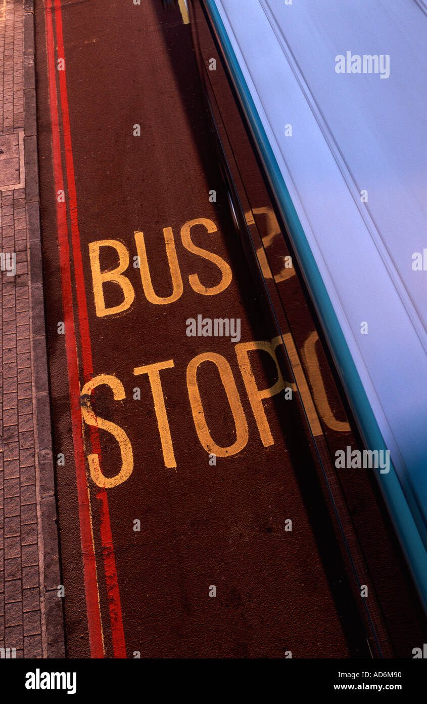 Bus lane and large vehicle in high speed blurred motion with Bus Stop ...