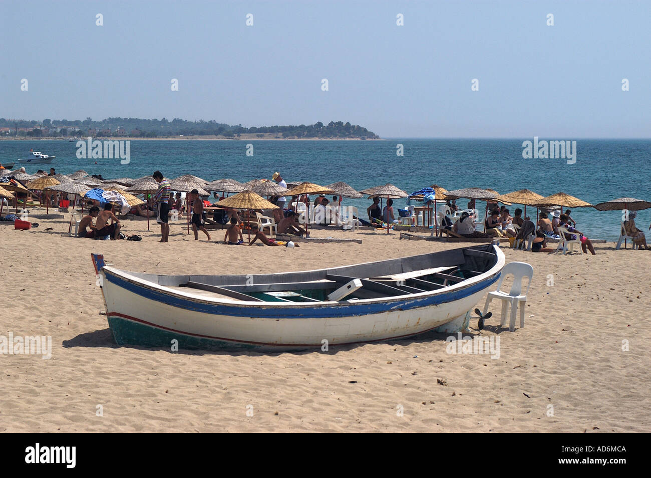 to go to bozca ada island which is west of turkey you can wait and swim ...