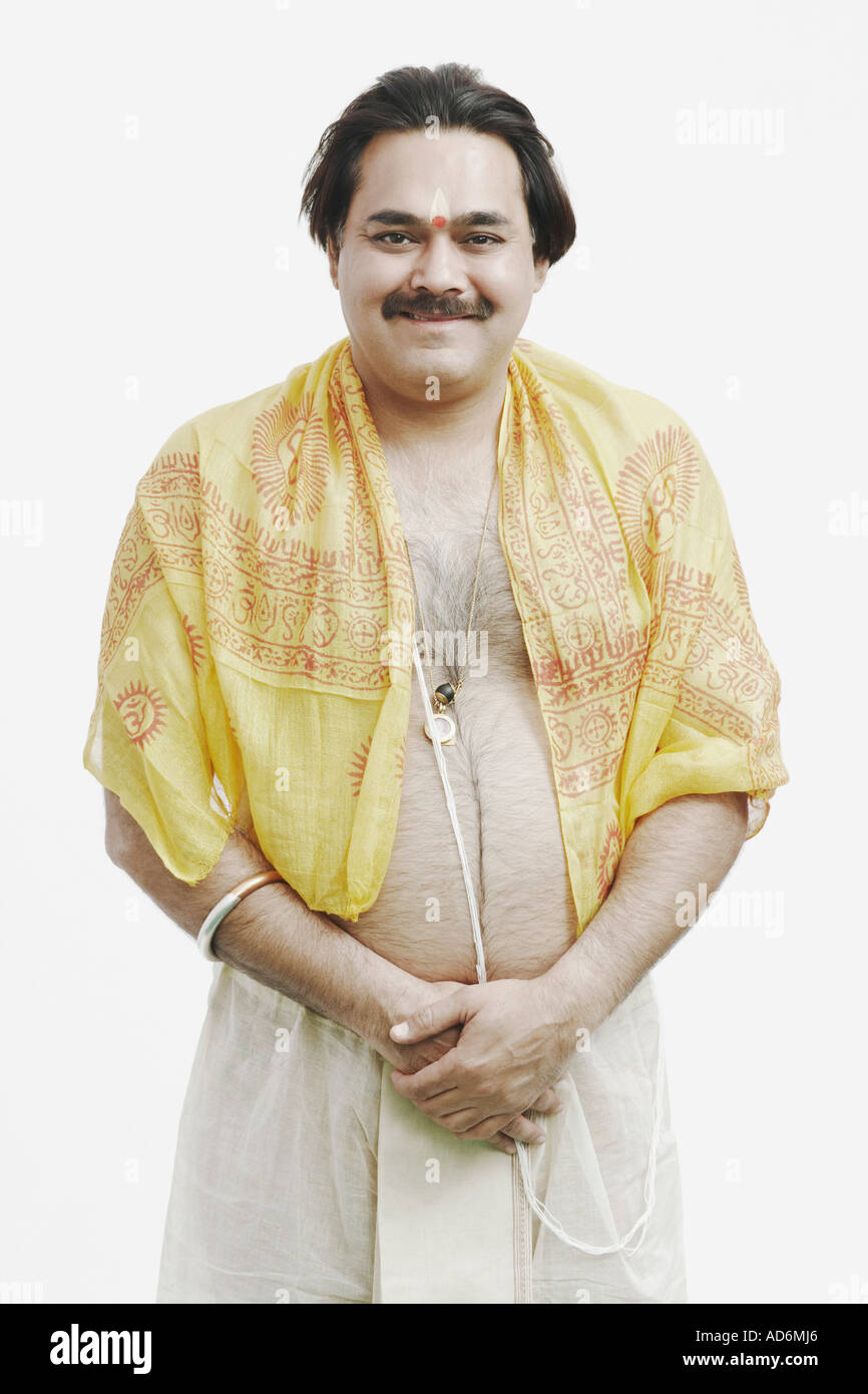 Portrait of a priest smiling Stock Photo - Alamy