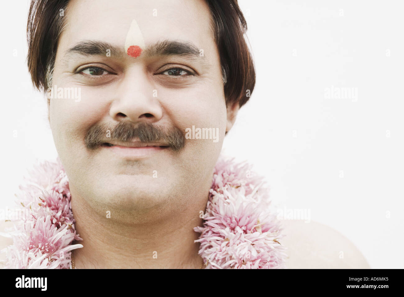 Portrait of a priest smiling Stock Photo - Alamy