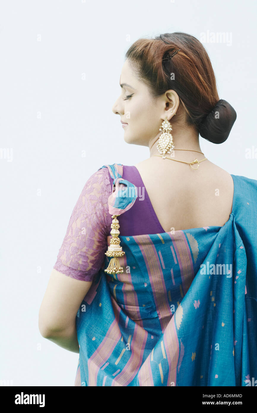 Young indian woman sari rear view hi-res stock photography and images ...
