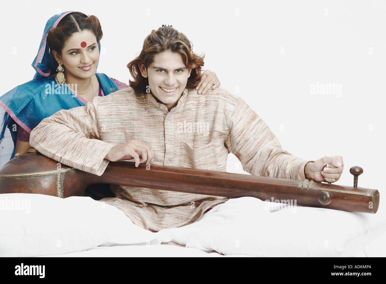 Portrait of a male musician playing the sitar Stock Photo - Alamy
