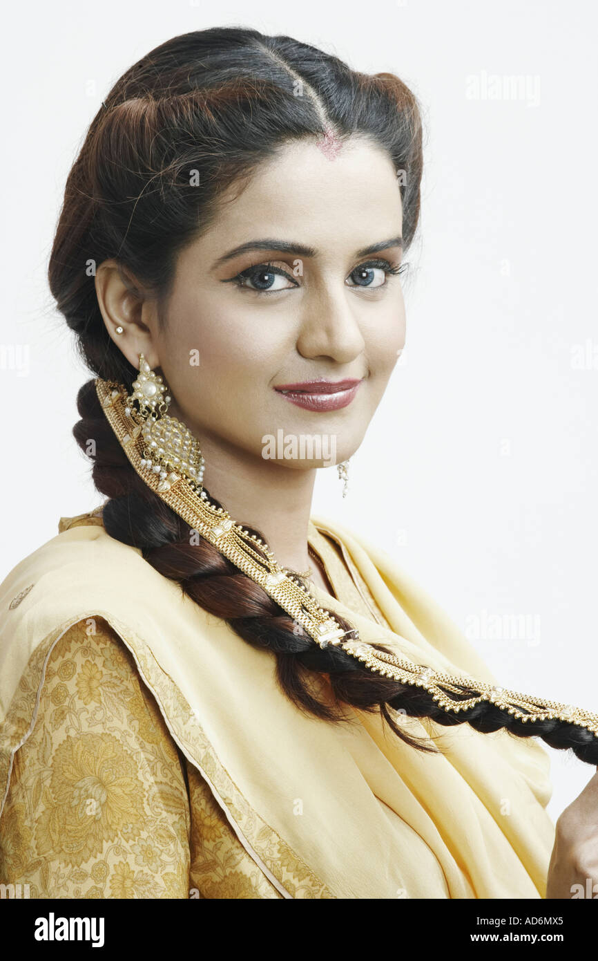 Side profile of a young woman smiling Stock Photo - Alamy