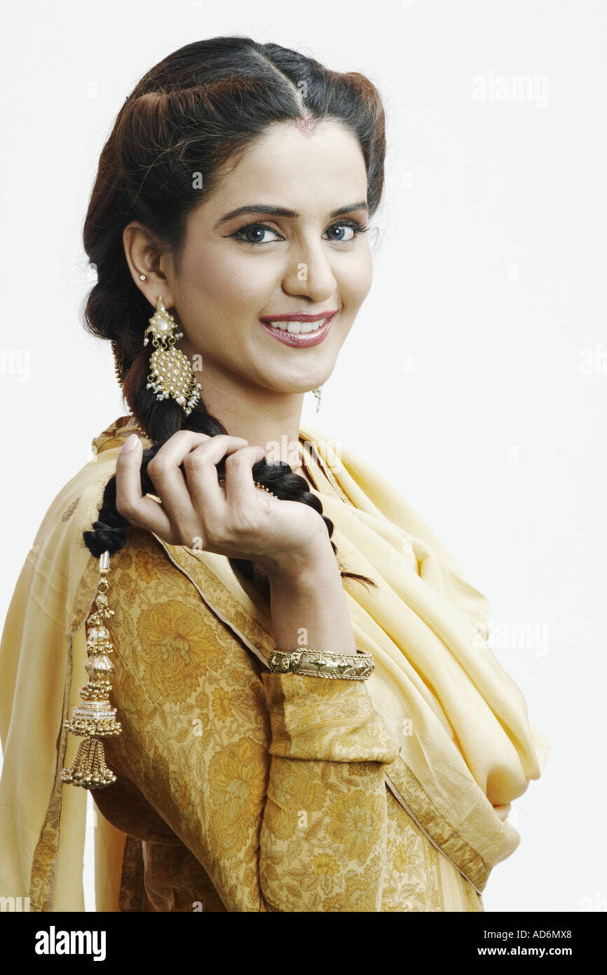 Side profile of a young woman smiling Stock Photo - Alamy