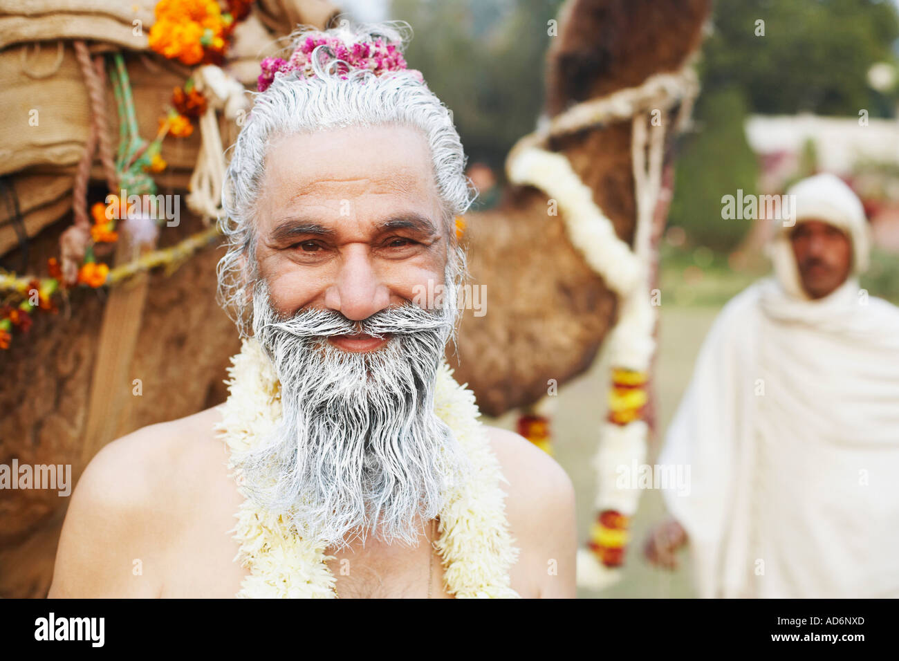 Portrait of a priest smiling Stock Photo - Alamy