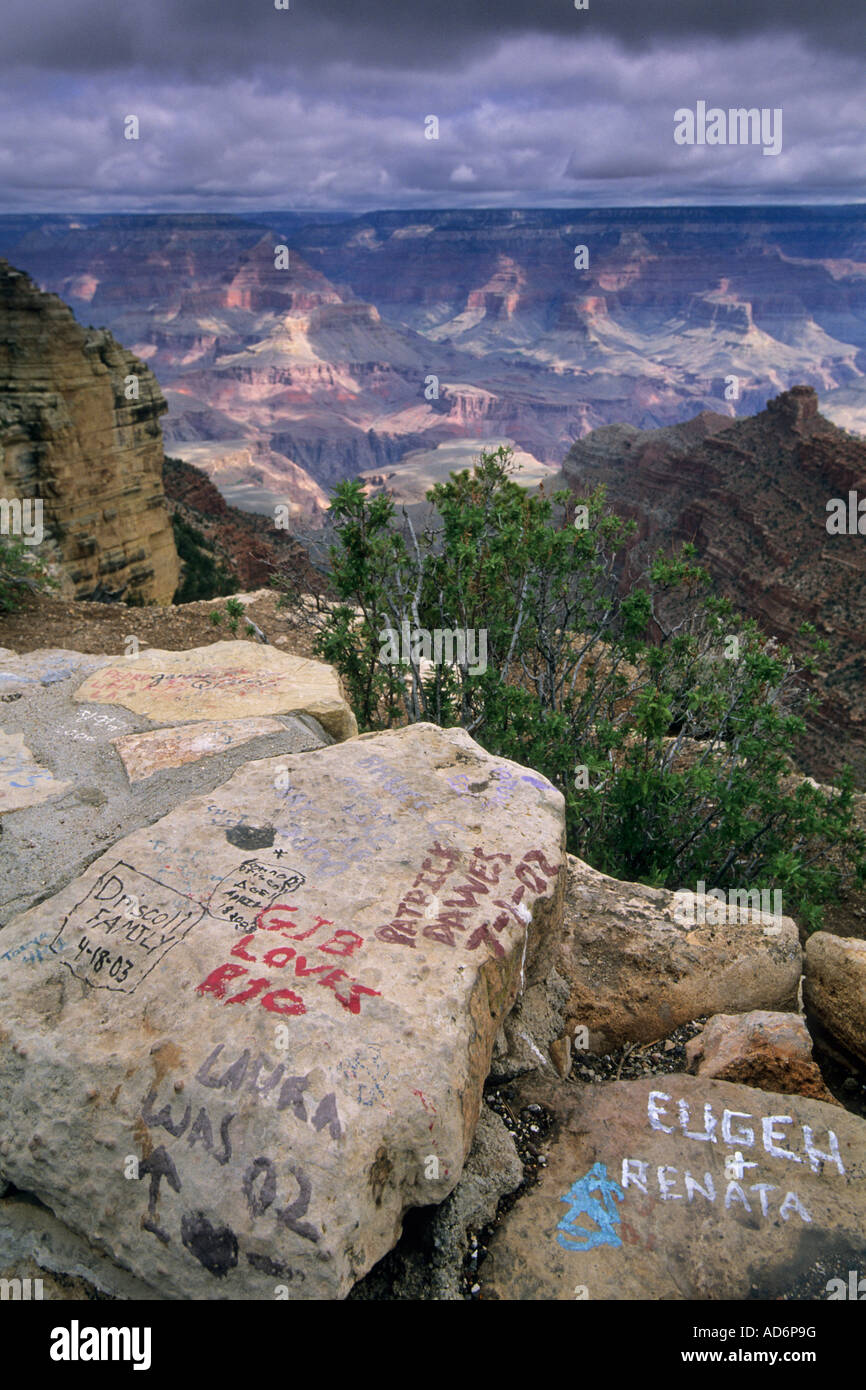 Tourist graffiti on rock wall near Yaki Point South Rim Grand Canyon ...