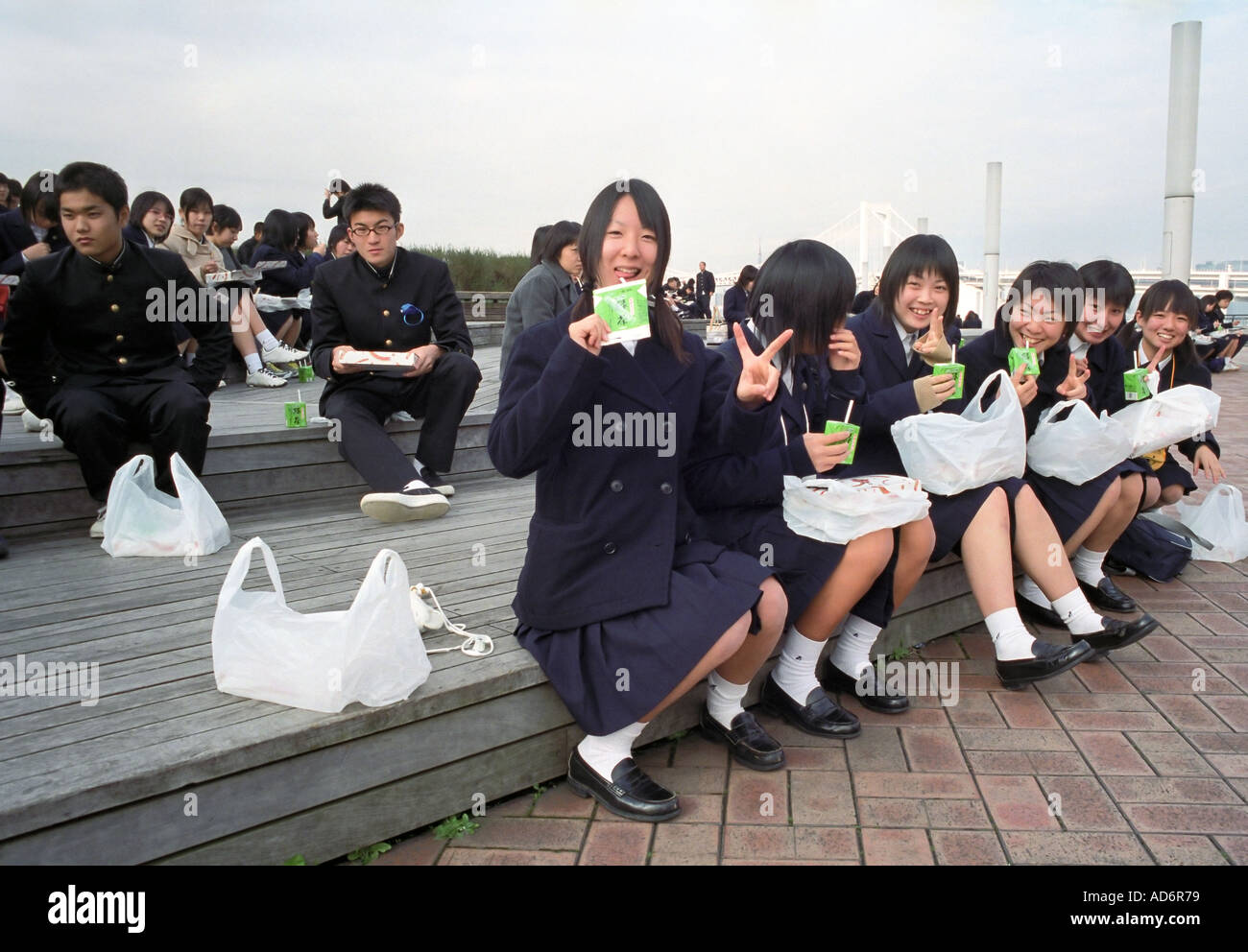 High school students on a field trip to Odaiba Tokyo having their lunch ...