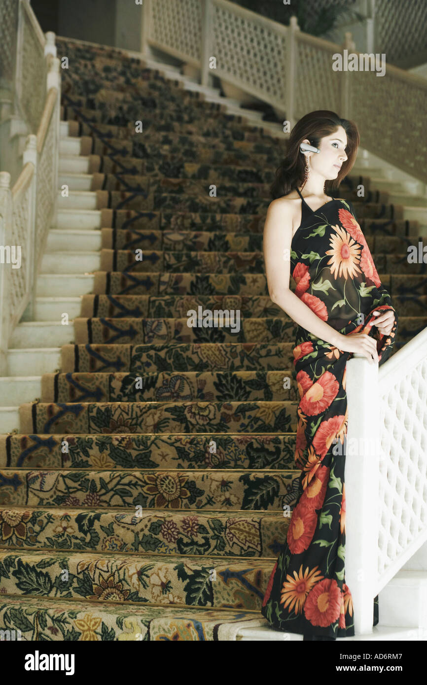 Standing on a staircase hi-res stock photography and images - Alamy