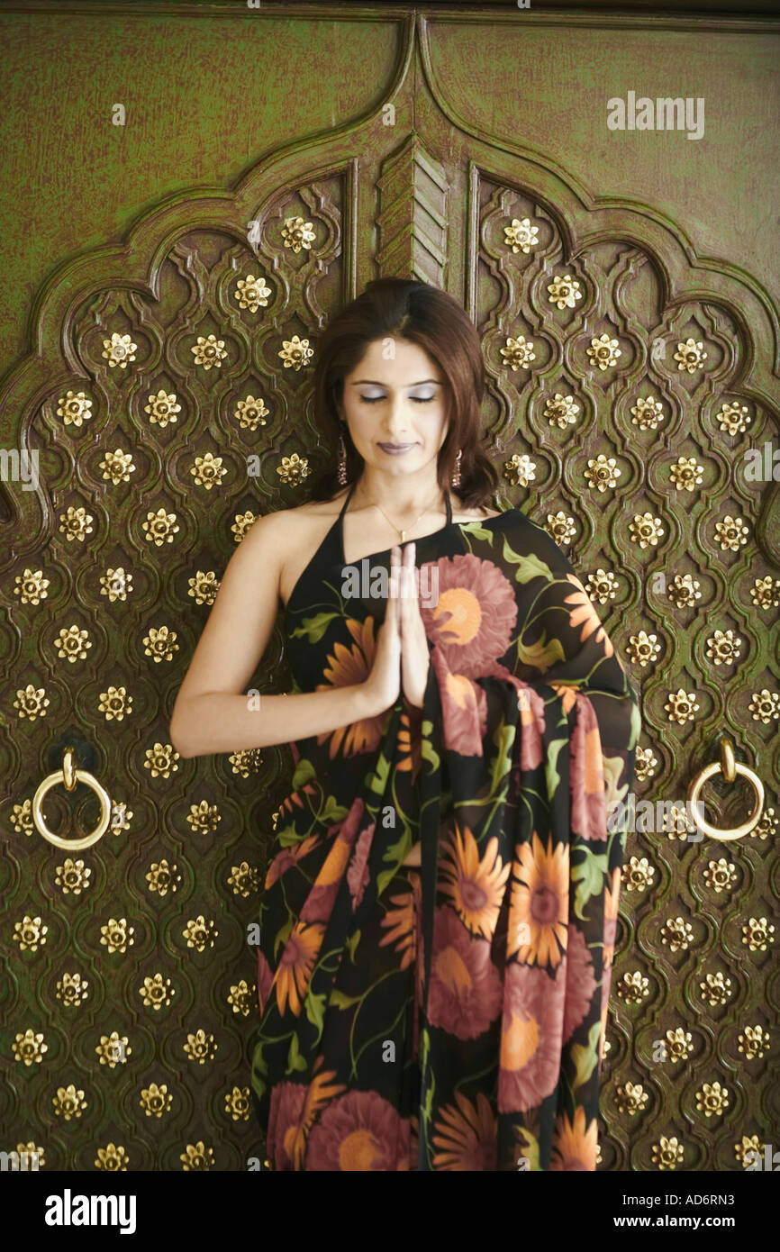 Standing eyes closed praying religion spirituality hi-res stock ...
