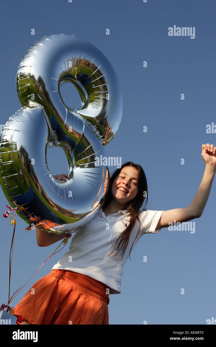 Girl with the number Eight Stock Photo - Alamy