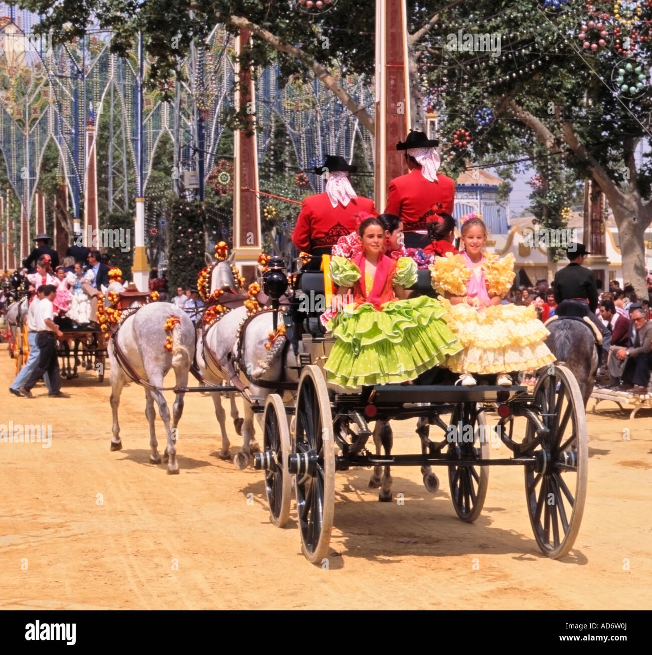 Jerez Horse Fair, Feria del Caballo, young girls on carriage dressed in ...