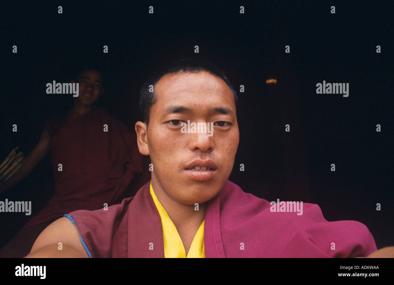 China Yunnan Province A monk takes a self portrait Stock Photo - Alamy
