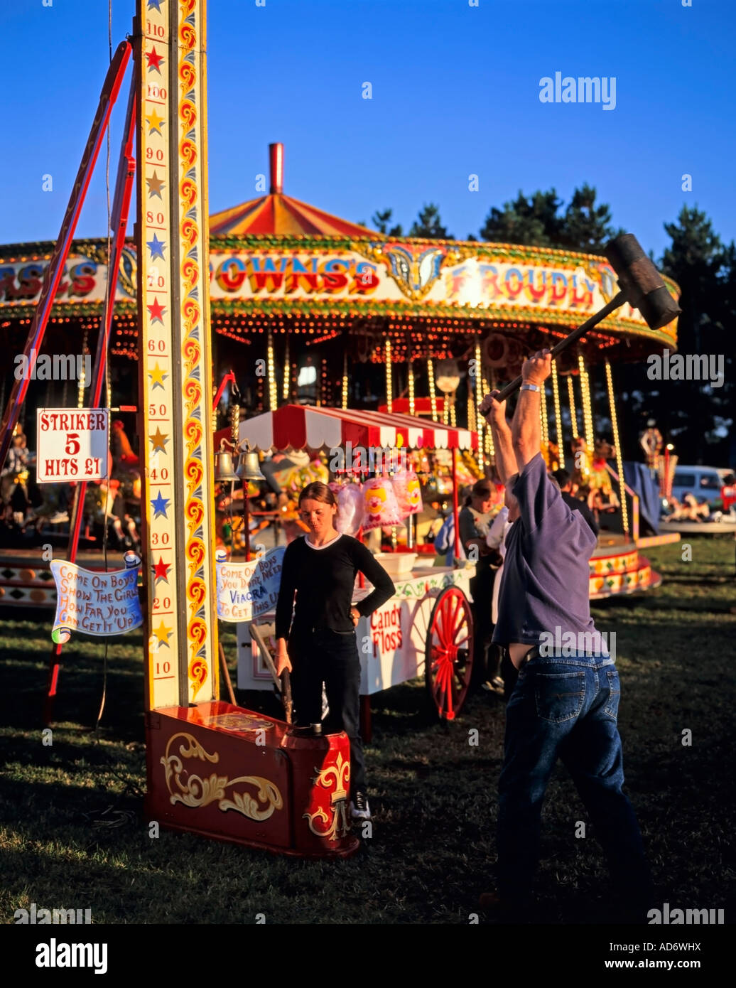Traditional Carnival Strongman Striker Merry-go-Round Carousel Stock ...