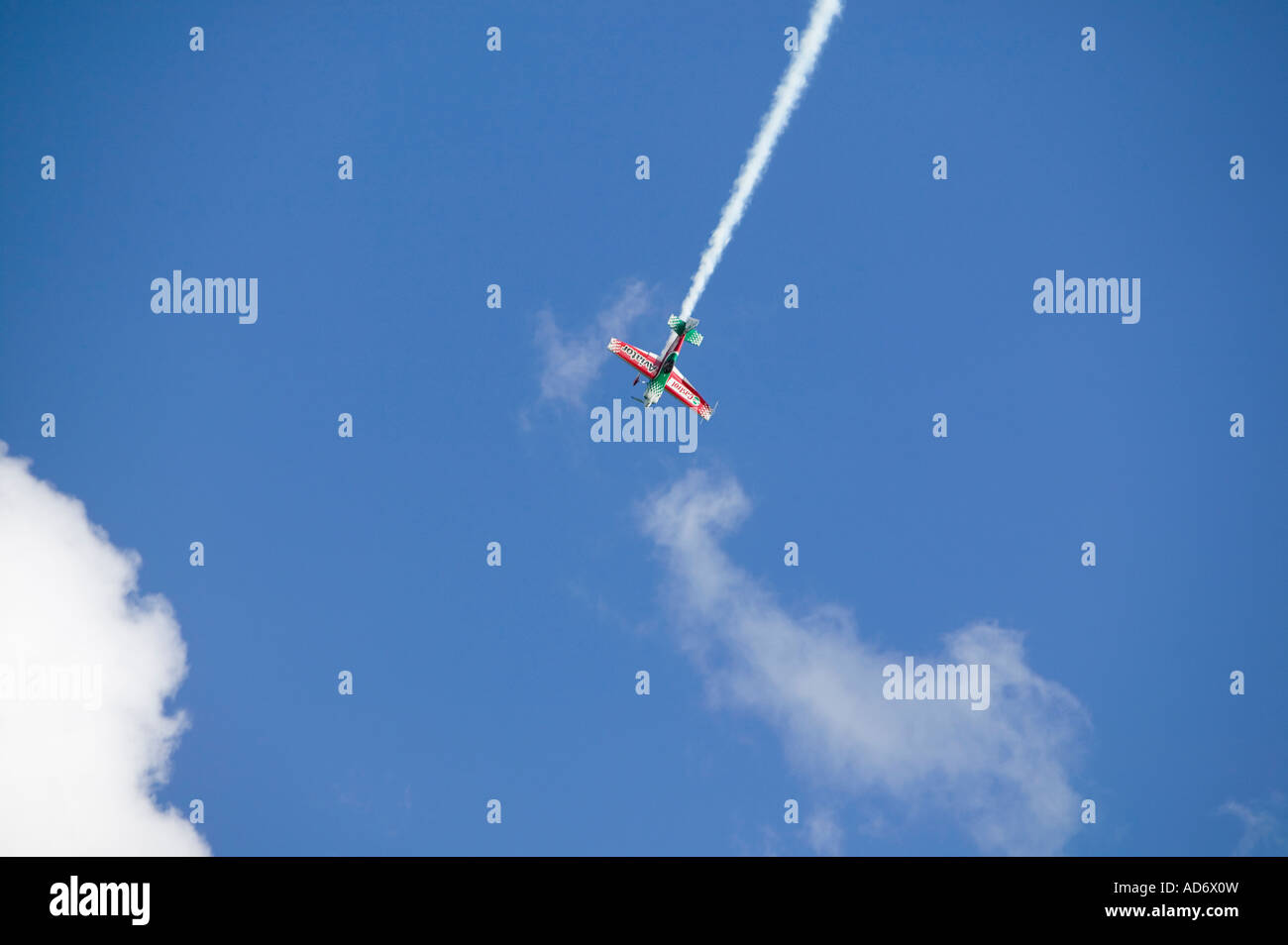 colourful acrobatic aeroplane in the sky Stock Photo - Alamy