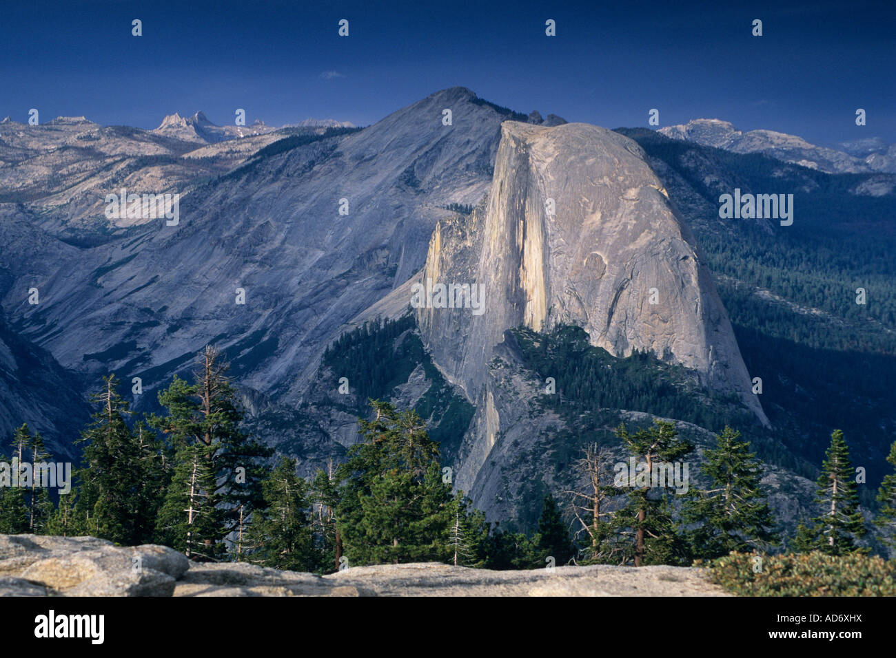 Sunset light through storm clouds on Half Dome from Sentinel Dome ...
