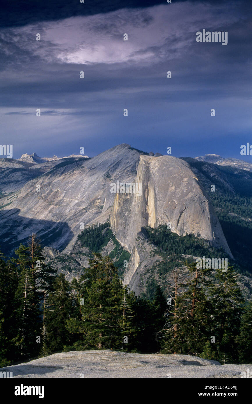 Sunset light through storm clouds on Half Dome from Sentinel Dome ...