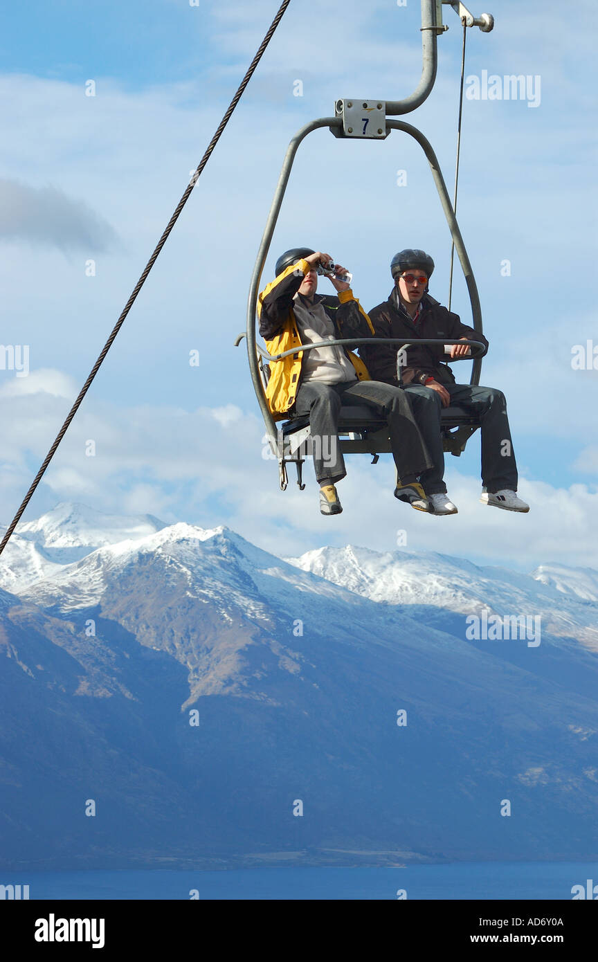 Two people on chair lift hi-res stock photography and images - Alamy
