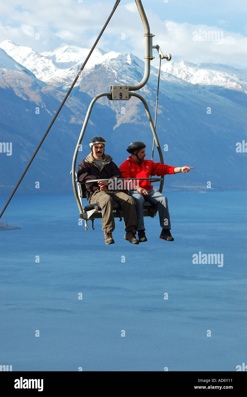 Two people on chair lift hi-res stock photography and images - Alamy