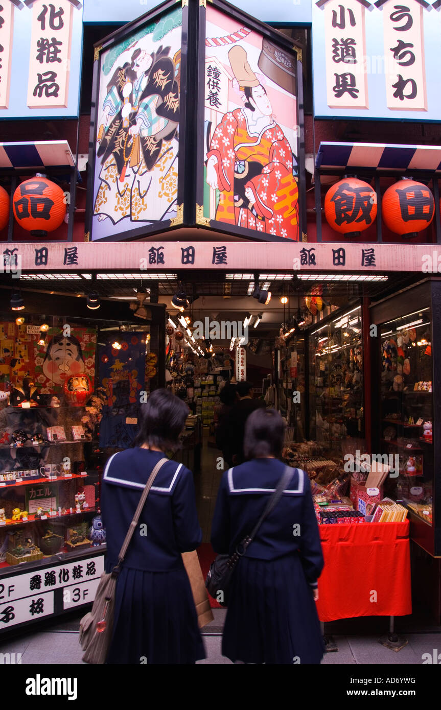 Japan Honshu Island Tokyo asakusa school girls outside a souvenir shop ...