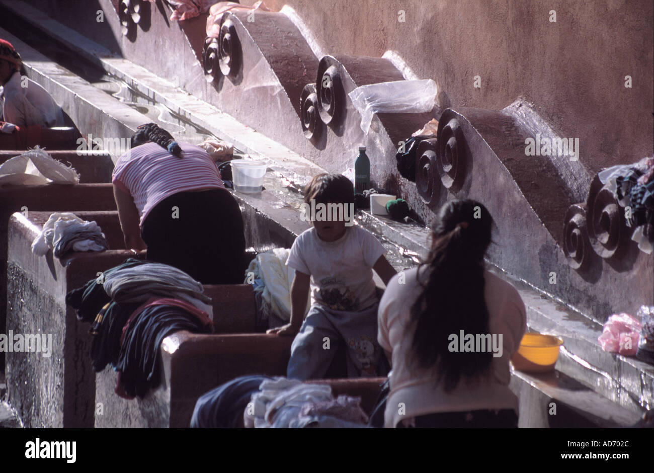 Women washing clothes at the lavanderia San Miquel de Allende Mexico ...