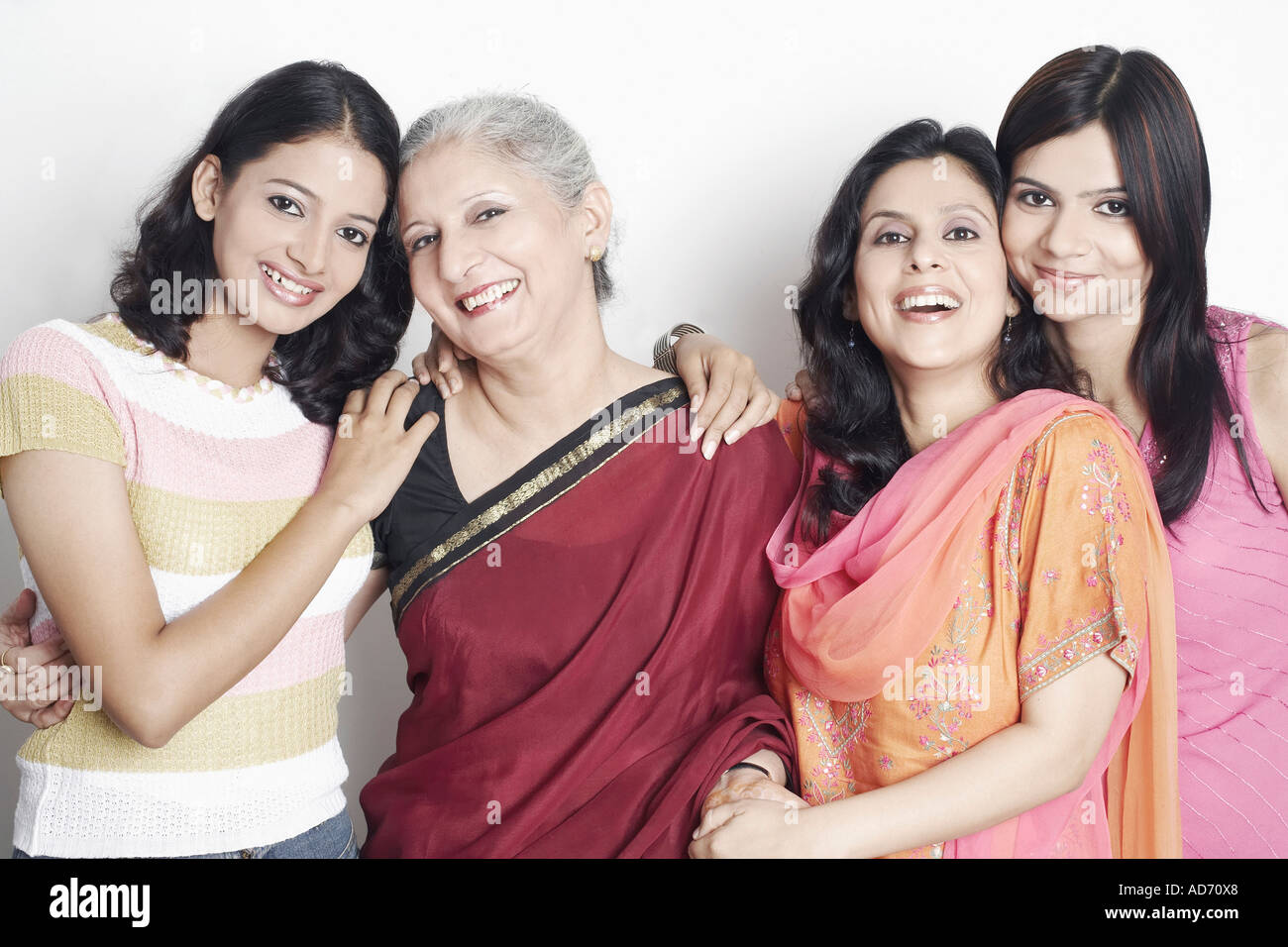 Portrait of four women standing Stock Photo - Alamy