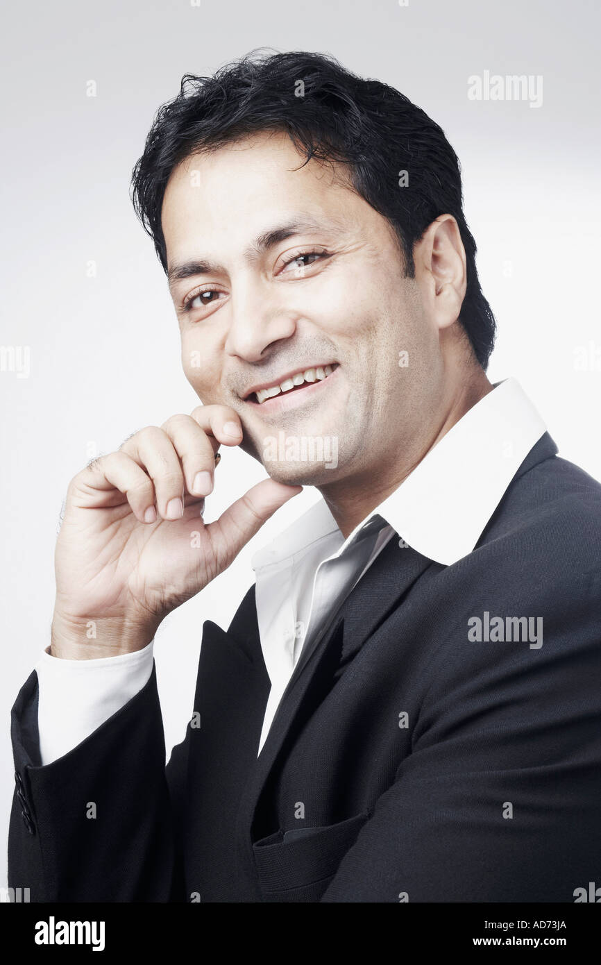 Side profile of a businessman smiling Stock Photo - Alamy