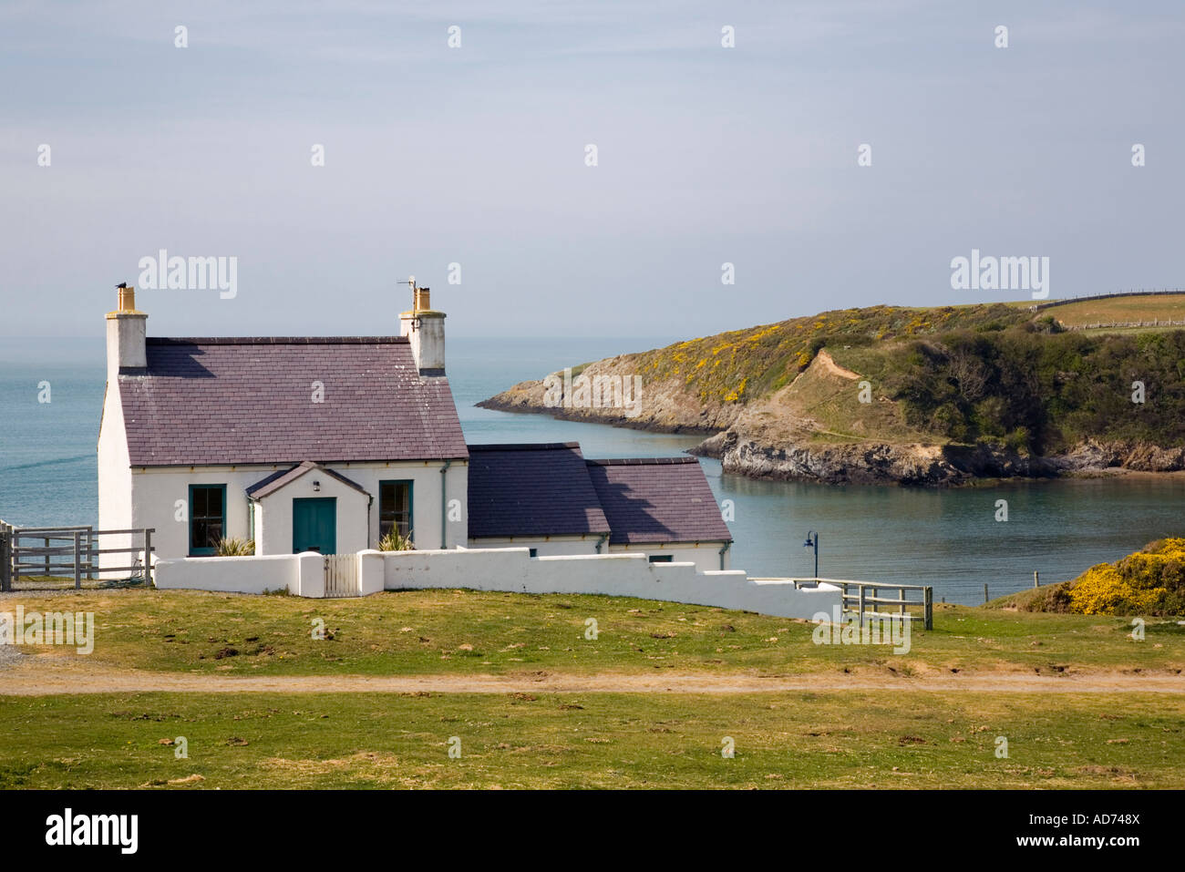 Cemaes Anglesey North Wales UK. Traditional white washed cottage with ...