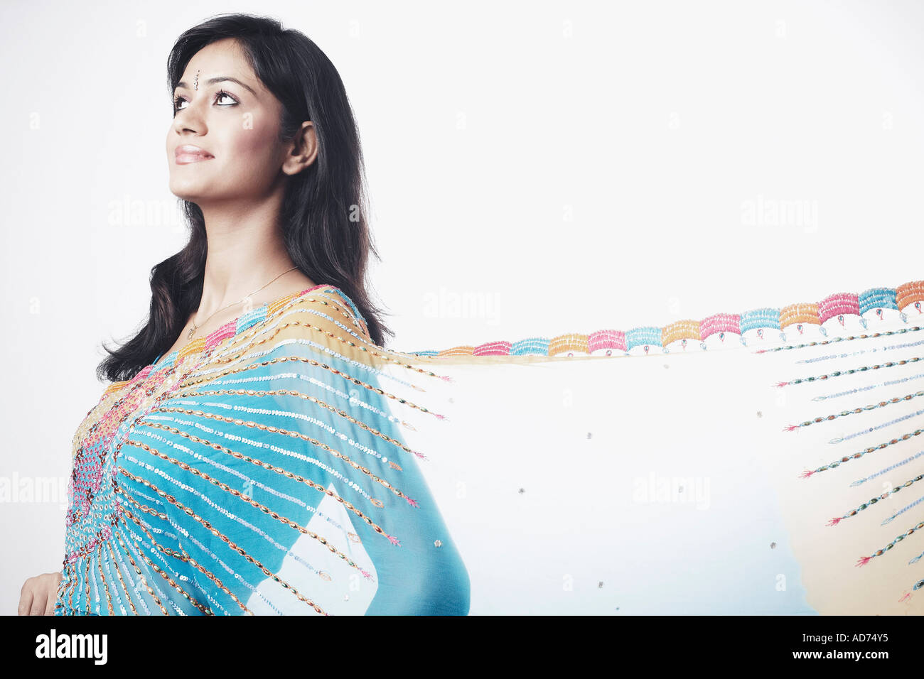 Side profile of a young woman looking up Stock Photo - Alamy