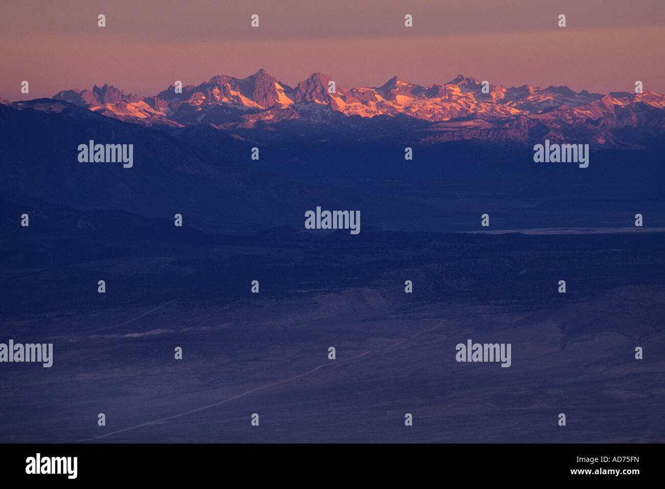 Sunrise light on the Ritter Range High Sierra seen from the Ancient ...