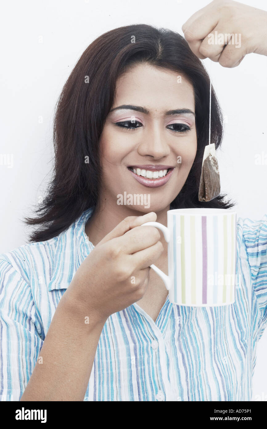 Woman hand teabag hi-res stock photography and images - Alamy