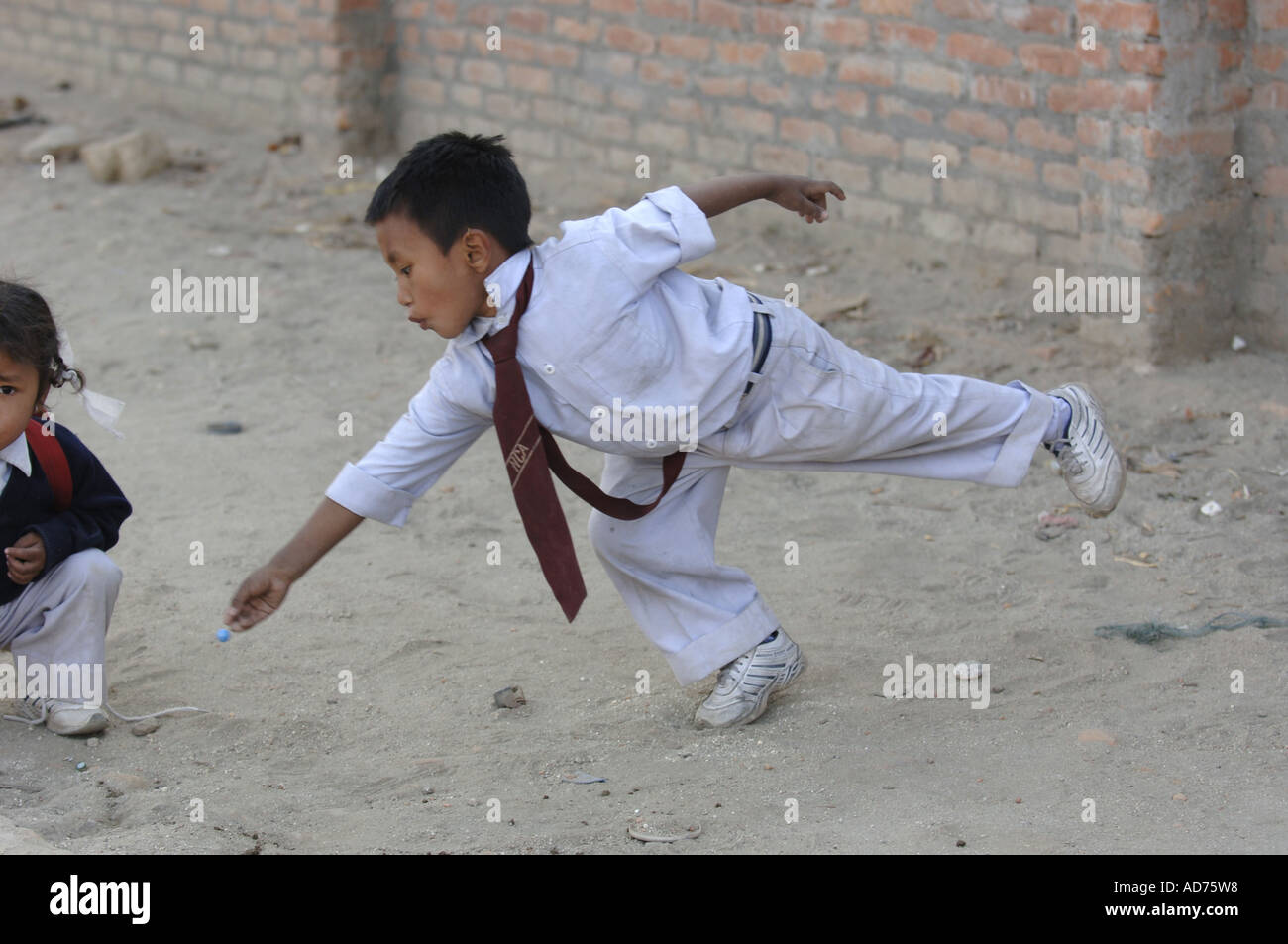 Children playing marbles hi-res stock photography and images - Alamy