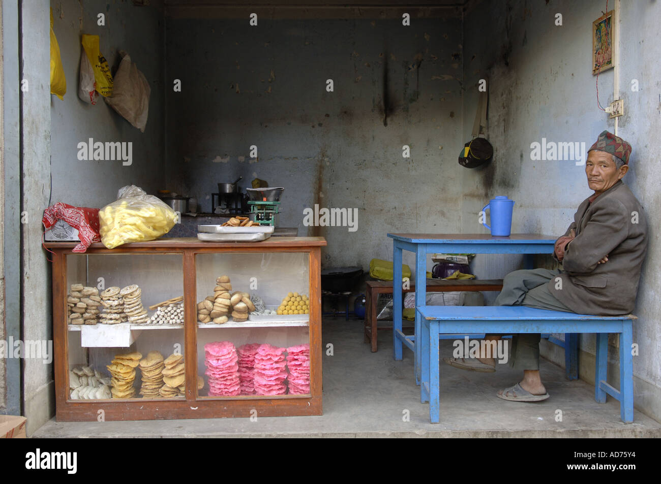 Small typical local shop and cafe owner, Kathmandu, Nepal Stock Photo ...