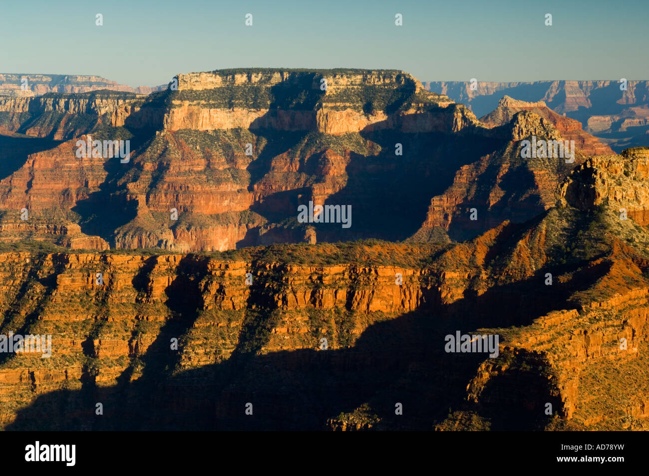 Sunset light on eroded cliffs along the North Rim from Point Sublime ...