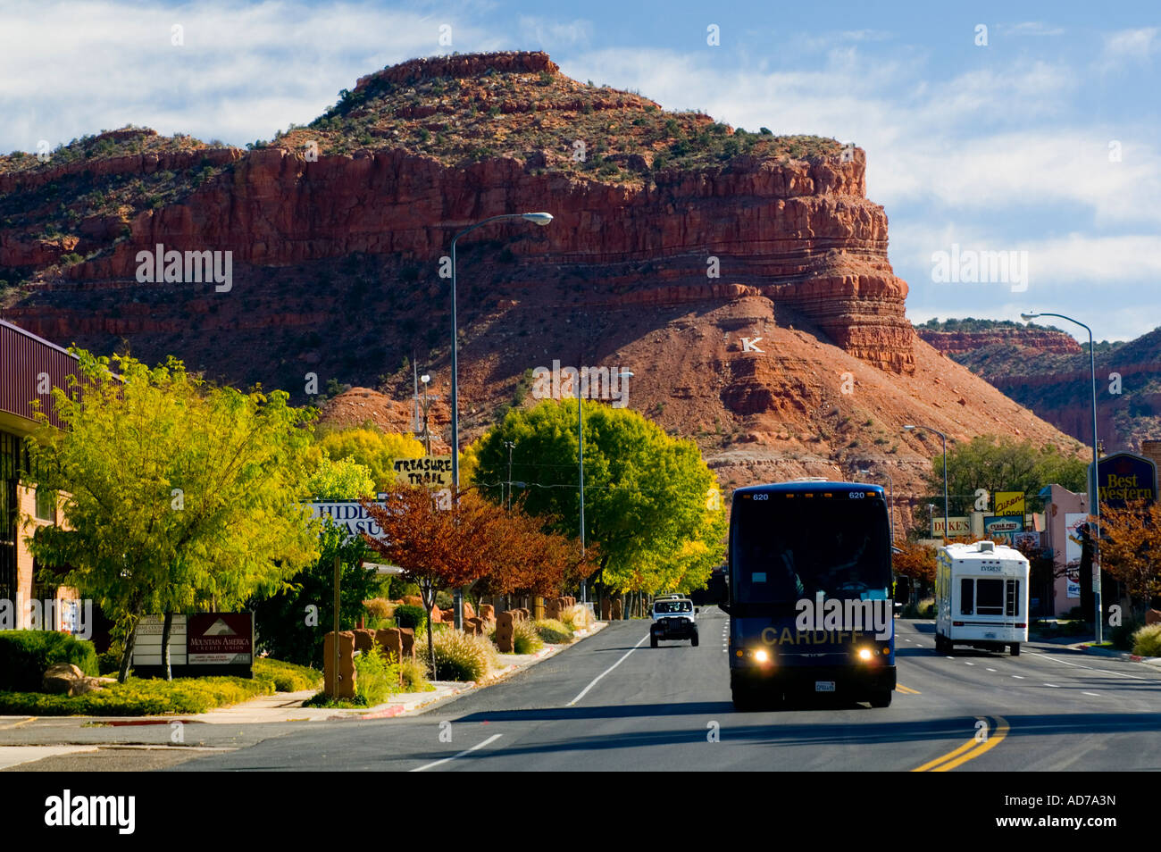 Red rock butte over traffic in downtown Kanab Kane County southern Utah ...