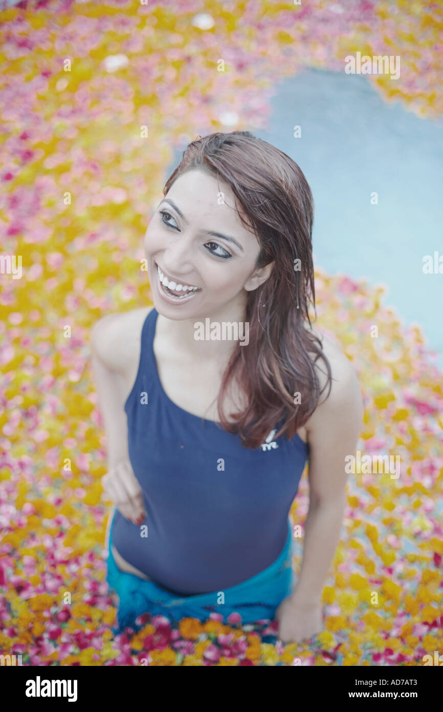 Woman standing in front of swimming pool hi-res stock photography and ...
