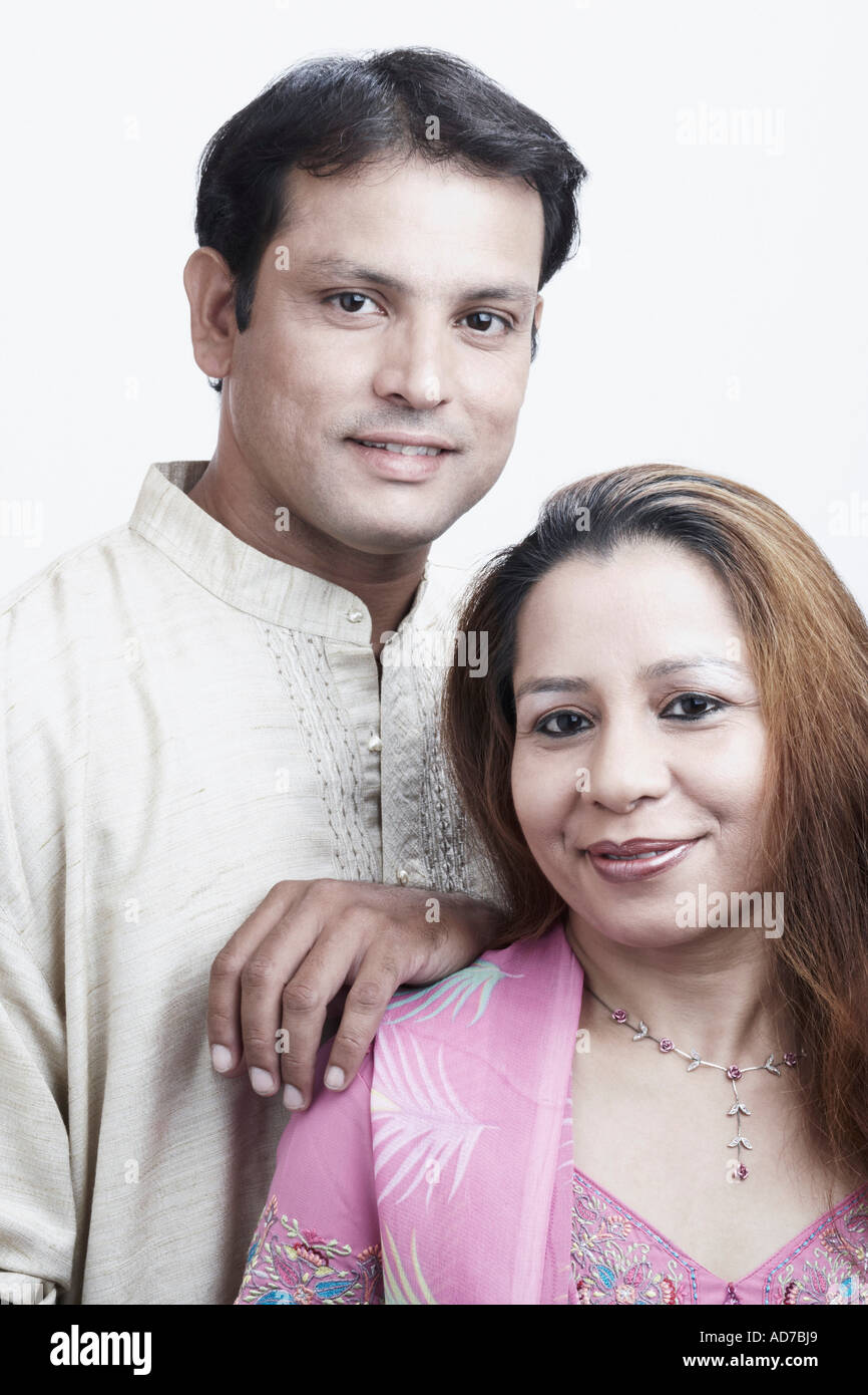 Portrait of a mid adult couple smiling Stock Photo - Alamy