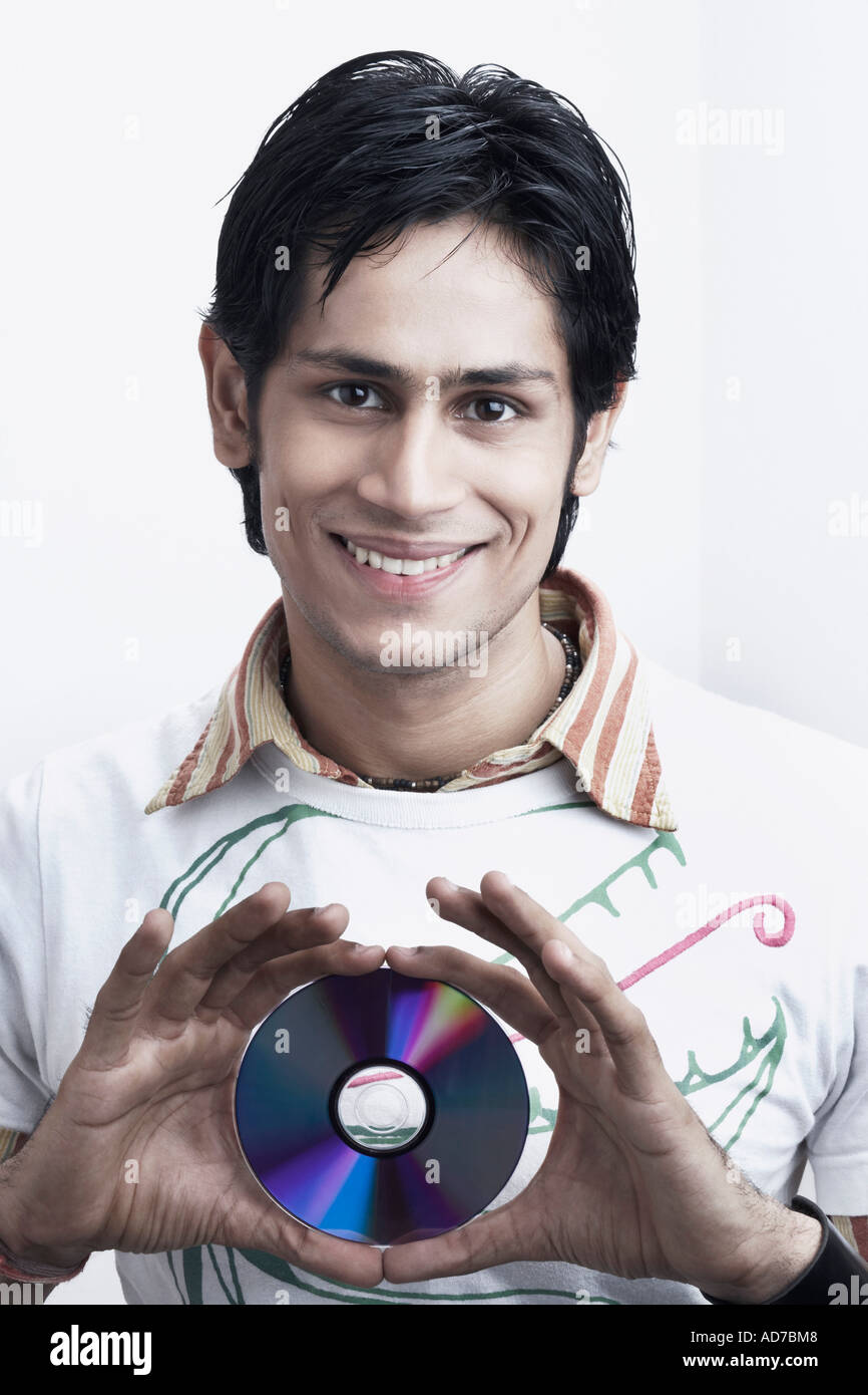 Posing head shot holding technology smiling hi-res stock photography ...