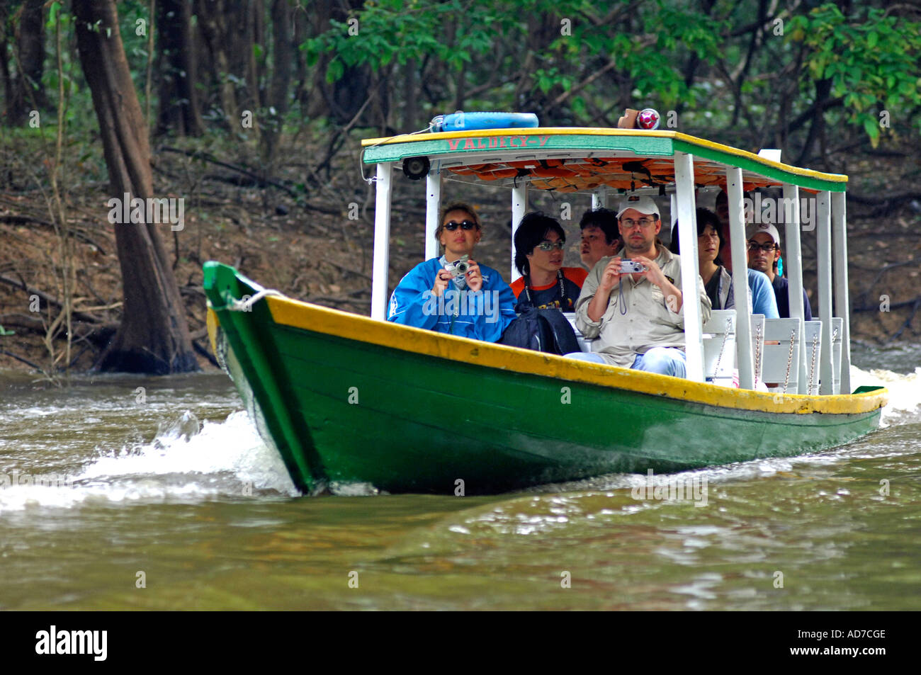 Boat excursion in the tropical rainforest Amazonia Brazil Stock Photo ...