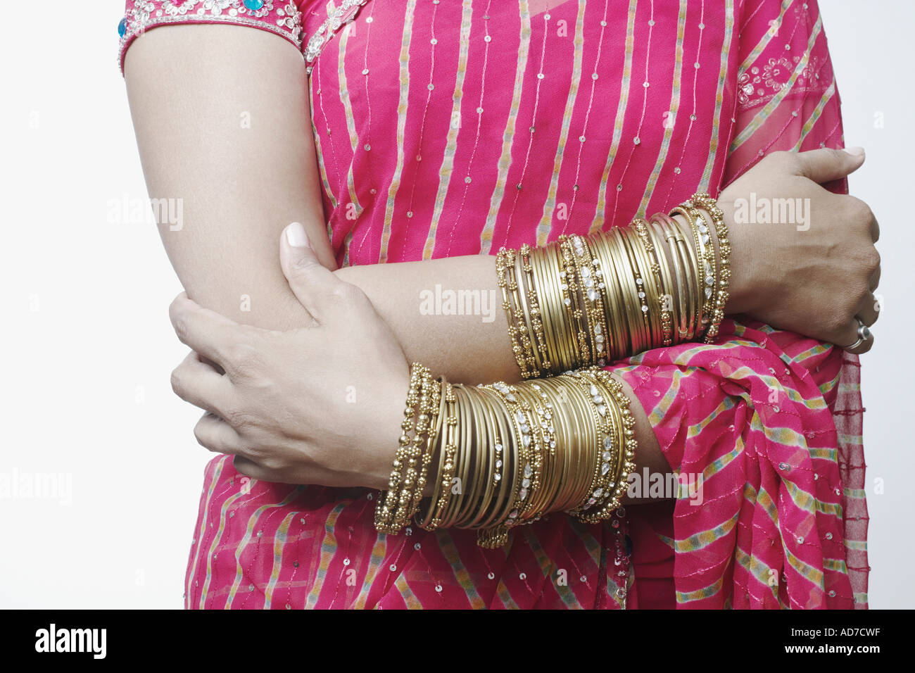 Mid section view of a woman wearing bangles Stock Photo - Alamy